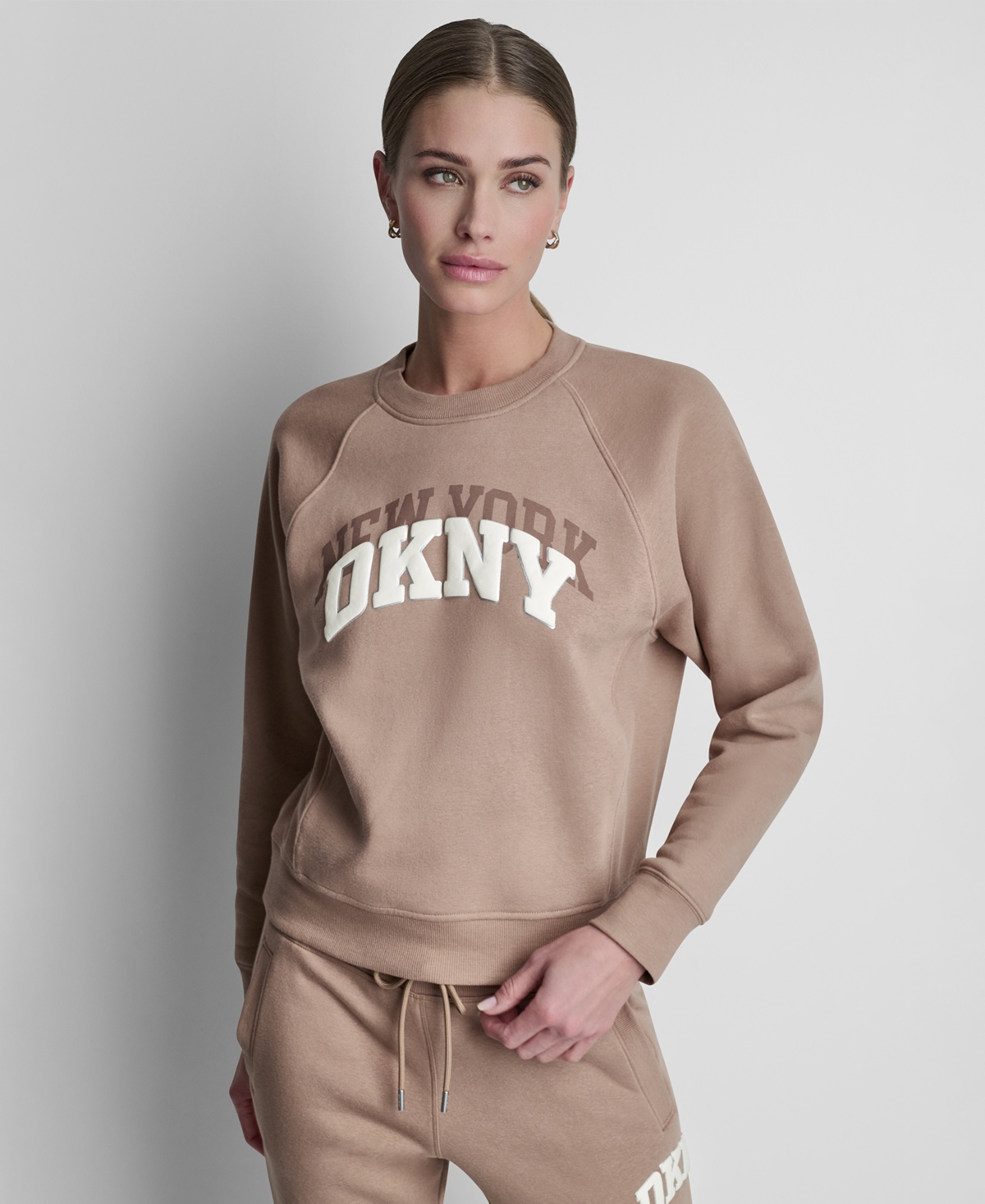 Click here for Dkny Sport Womens Ny Shadow Varsity Logo Crewneck... prices