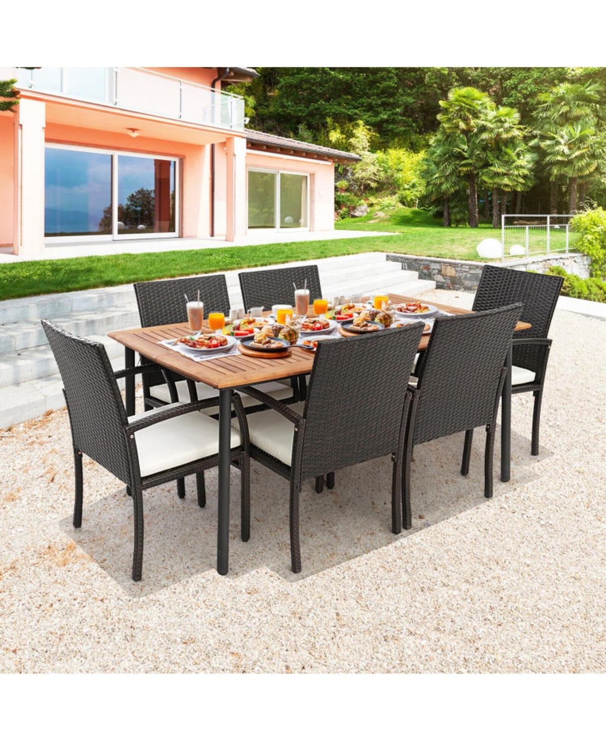 Click here for Gouun 7 Piece Outdoor Wicker Dining Set with 63 in... prices